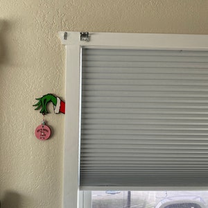 How the Grinch Stole Christmas Grinch’s Hand Holding an Ornament ...