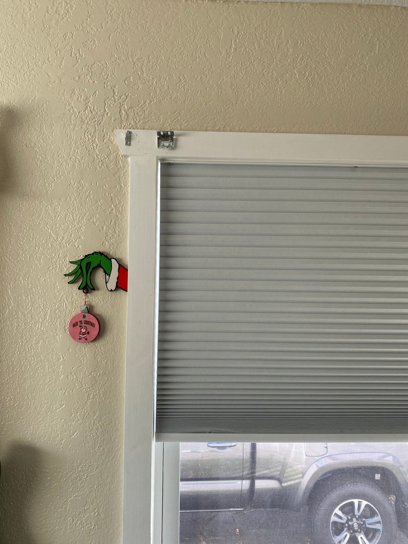 How the Grinch Stole Christmas Grinch’s Hand Holding an Ornament ...