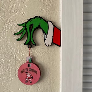 How the Grinch Stole Christmas Grinch’s Hand Holding an Ornament ...