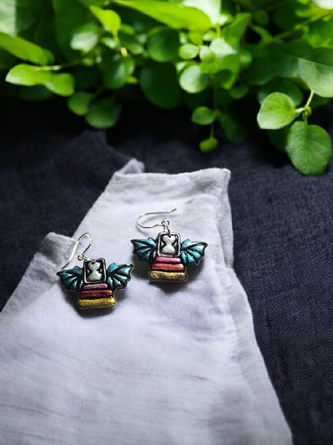 Whimsical Polymer Clay Dragon Wing Earrings With Hourglass and Books ...