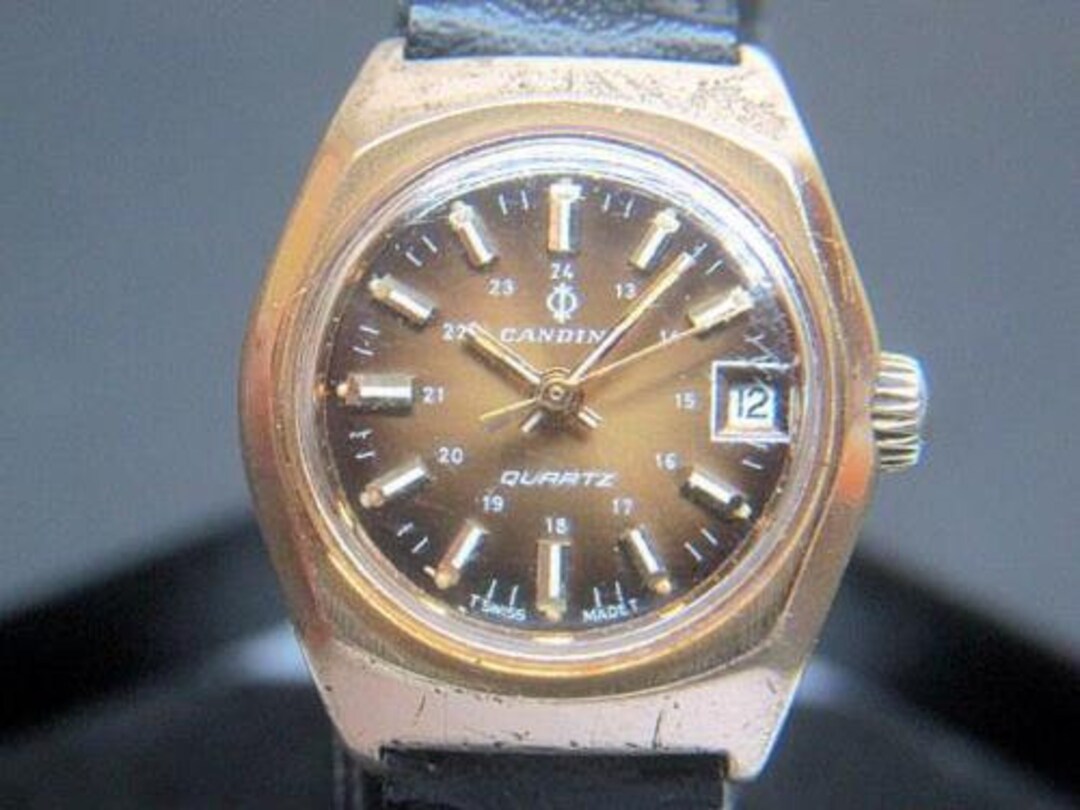 Candino Date 7 Jewel Swiss Made Quartz Wristwatch and Fossil Japanese ...