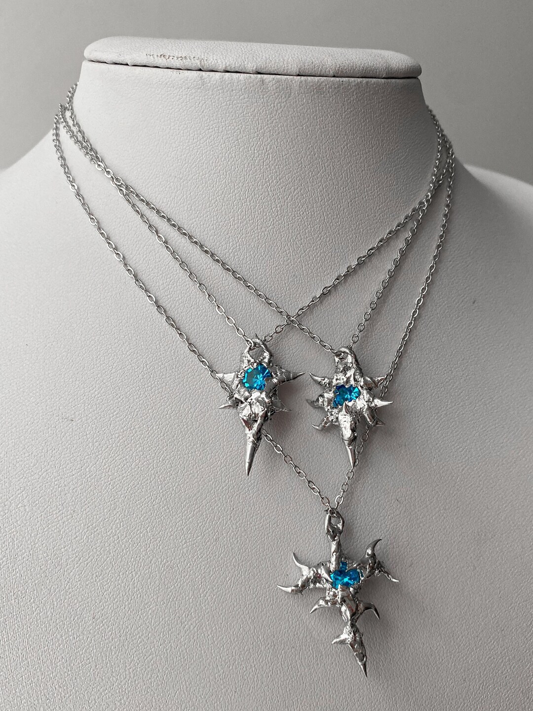 Spiky Sigil Crystal Pendants Blue Acubi Spikey Melted Metal Chrome ...