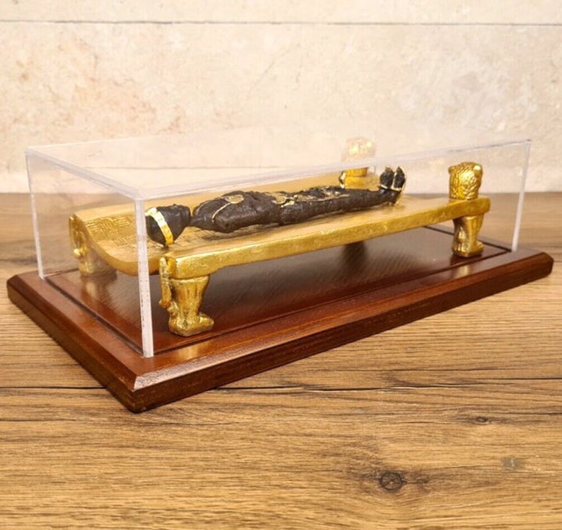 Egyptian Mummy Displayed on Lion-form Mummification Bed, Egyptian ...