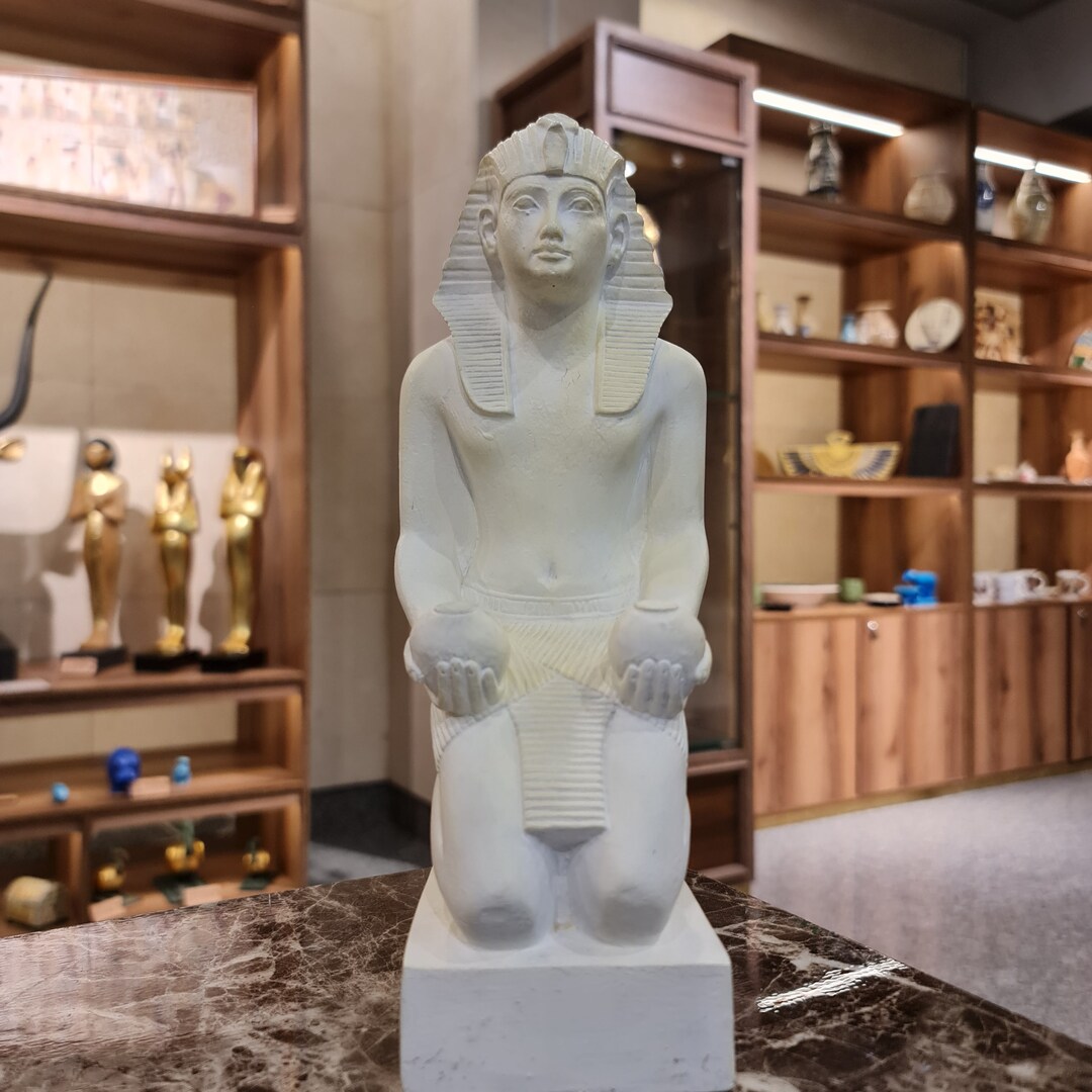 Elegant Kneeling Statue of King Thutmose III Offering Two Nu Vases ...