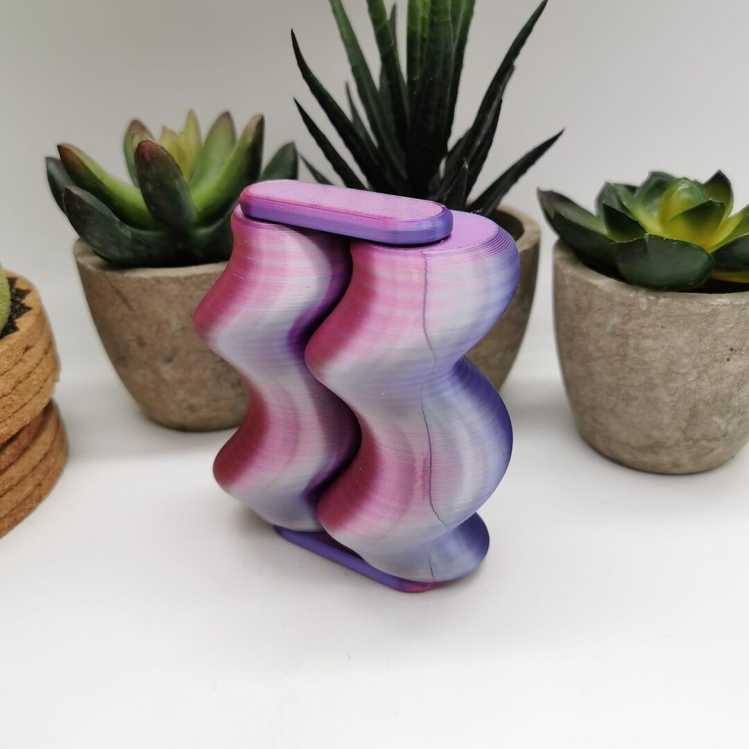 Tornado Rolling Fidget - the Infinite Hand Roller | Swirling Rollers ...