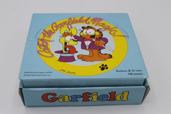 Store display box with 100 Garfield buttons, old stoc… - Gem
