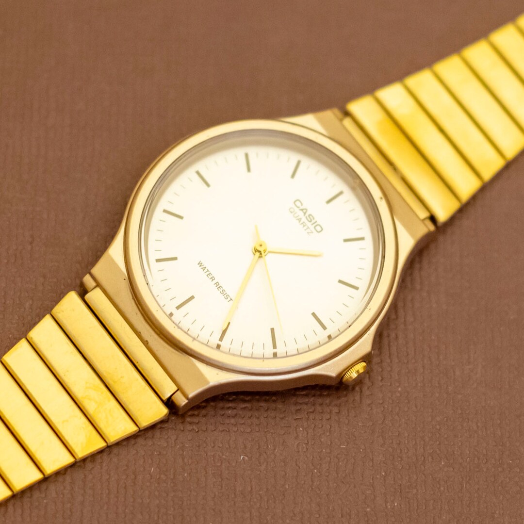 7 Inch, Vintage Minimalist Bar Lines Strap Gold Tone Watch by Casio U24 ...