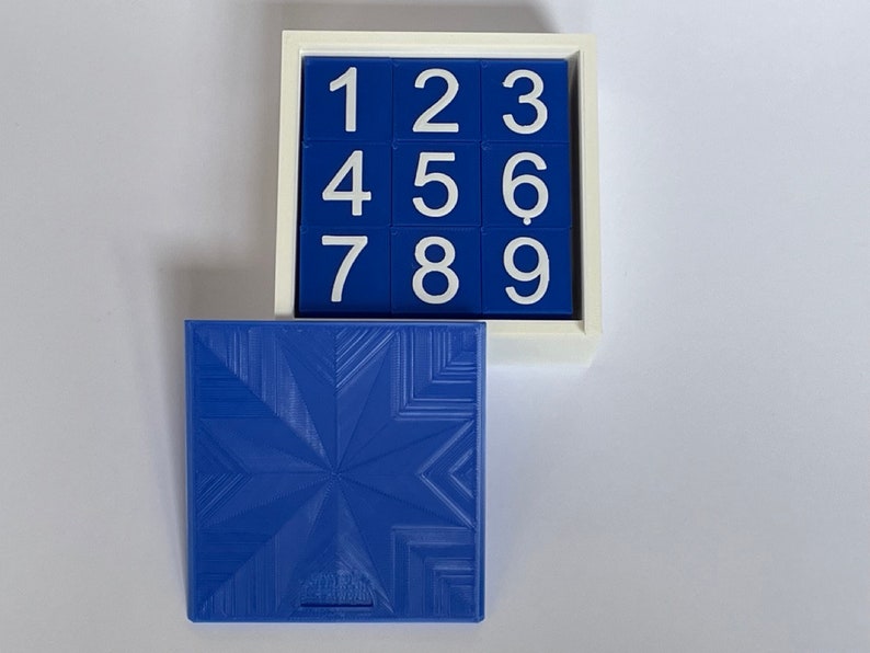 Cubos de Corsi con opción caja a juego. 9 cubos de plástico azul con ...