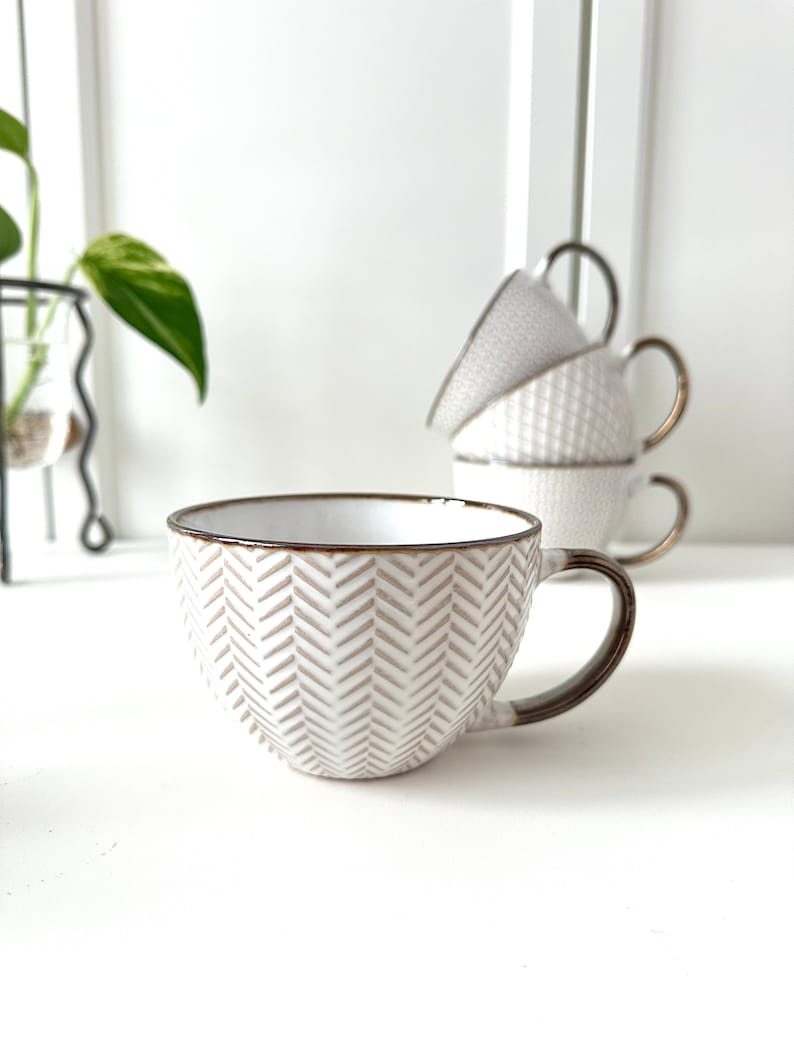 Vintage Beige and White Stoneware Mugs With Geometric Patterns and ...