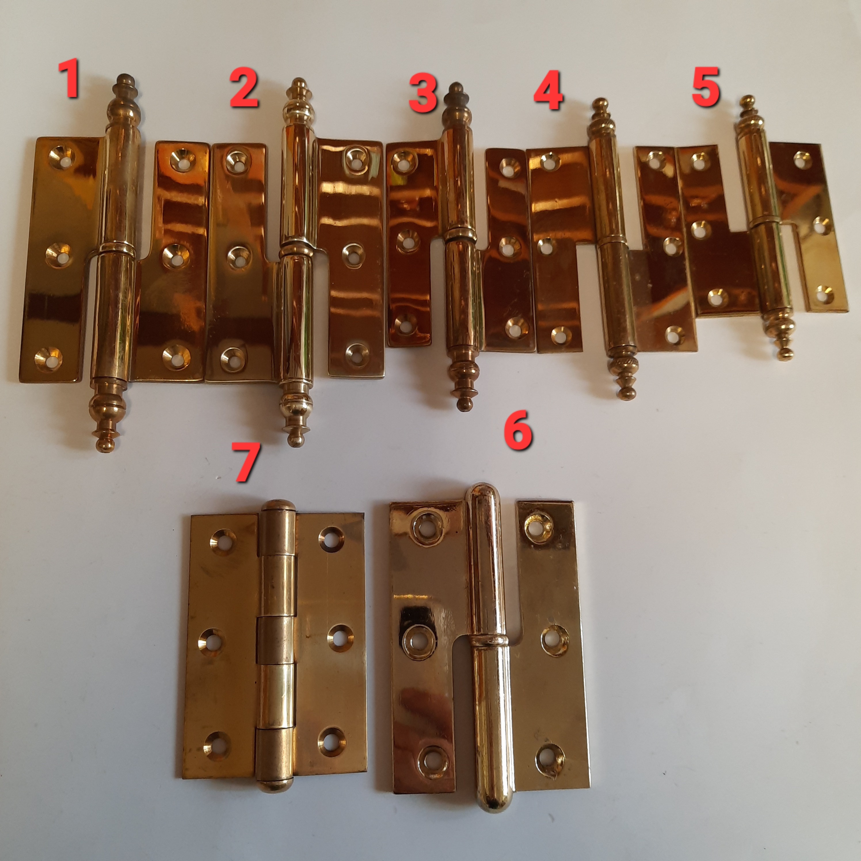 Door Hinges Are Brass. Decorative Door Hinges in Different Sizes. 3.9, 3.5,3.6 3.1 Portuguese ...