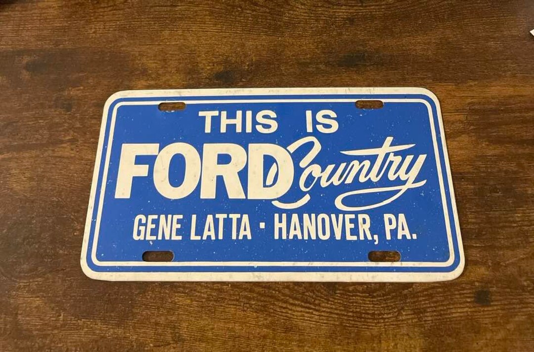 This is Ford Country Dealership Booster License Plate Gene Latta ...