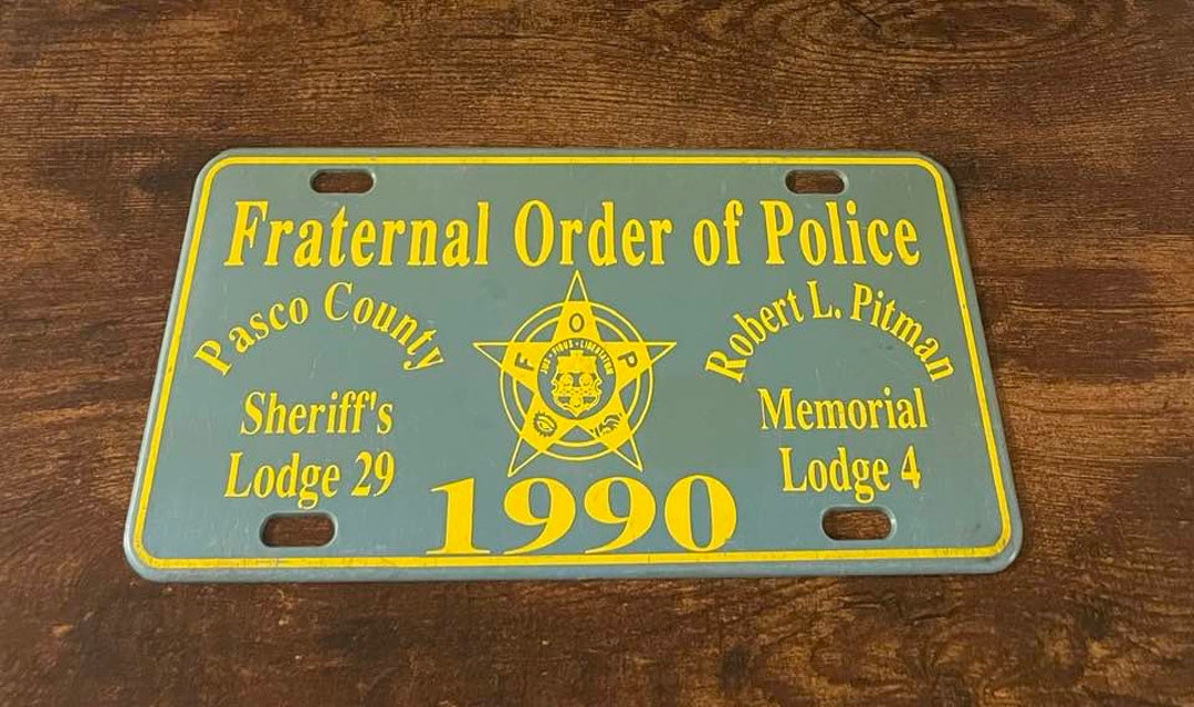 1990 Fraternal Order of Police Booster License Plate Pasco County ...