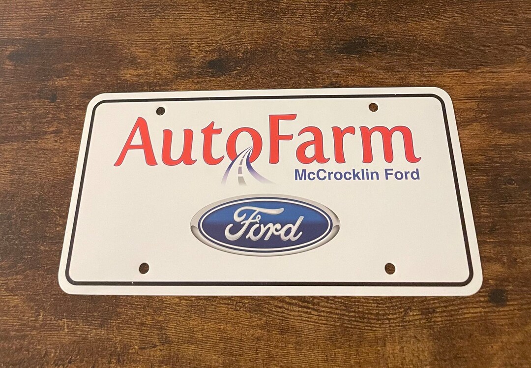 Auto Farm Ford Dealership Booster License Plate Mccrocklin Daleville ...