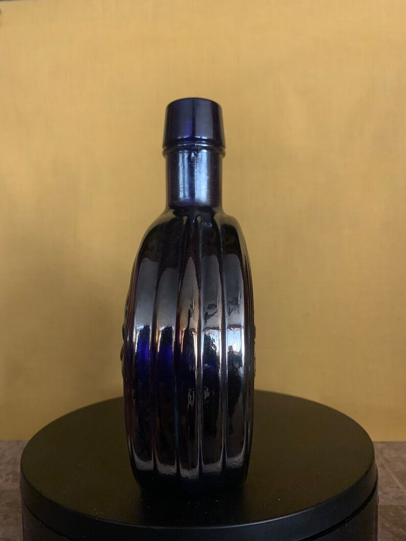 Vintage Wheaton Teddy Roosevelt Bottle Blue Iridescent Decanter ...