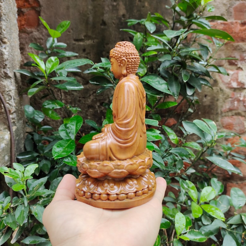 Gautama Buddha Sitting on a Lotus Flower, Statue of Gautama Buddha ...