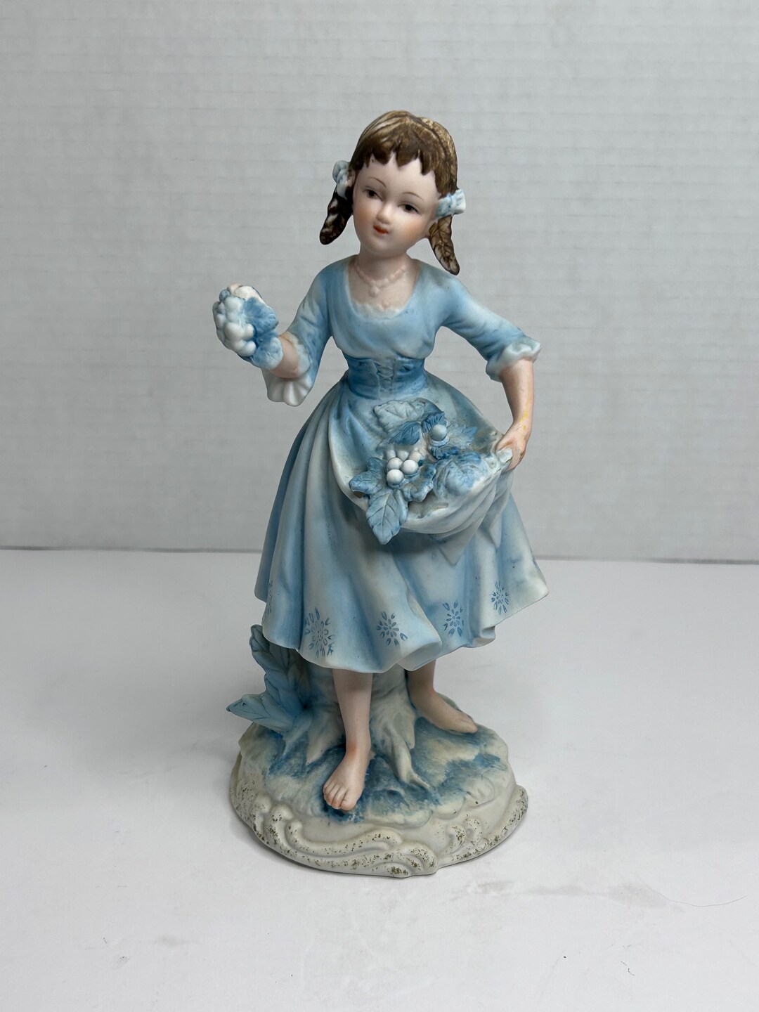 Vintage Andrea by Sadek Girl in Blue Barefoot Holding Grape Bunches for ...
