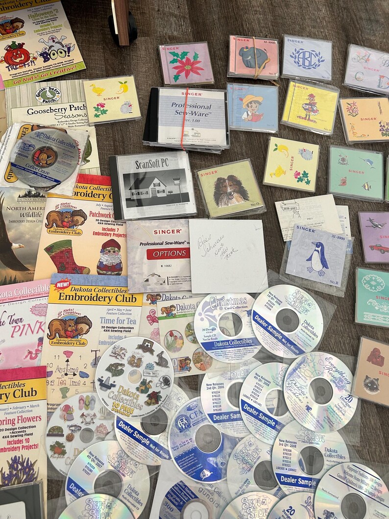 Singer Quantum XL-1000 Sewing Embroidery Machine With Dakota Designs ...