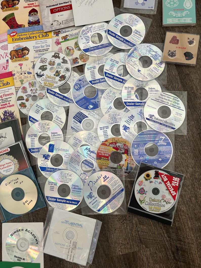 Singer Quantum XL-1000 Sewing Embroidery Machine With Dakota Designs ...