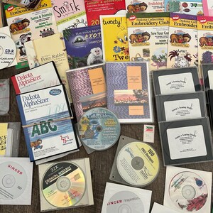 Singer Quantum XL-1000 Sewing Embroidery Machine With Dakota Designs ...