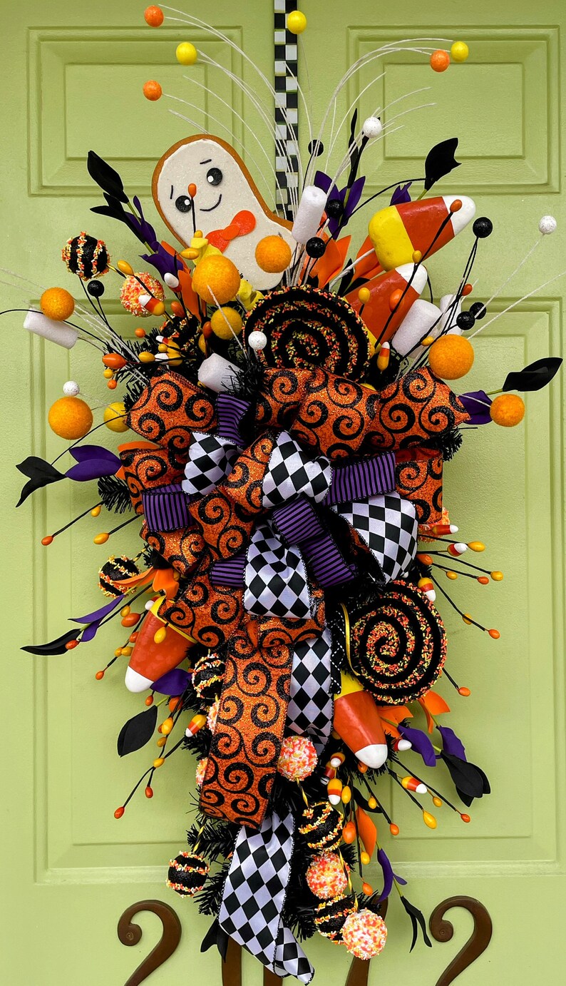 Halloween Ghosts and Sweets Swag With Candy Corn, Lollipops and Cake ...