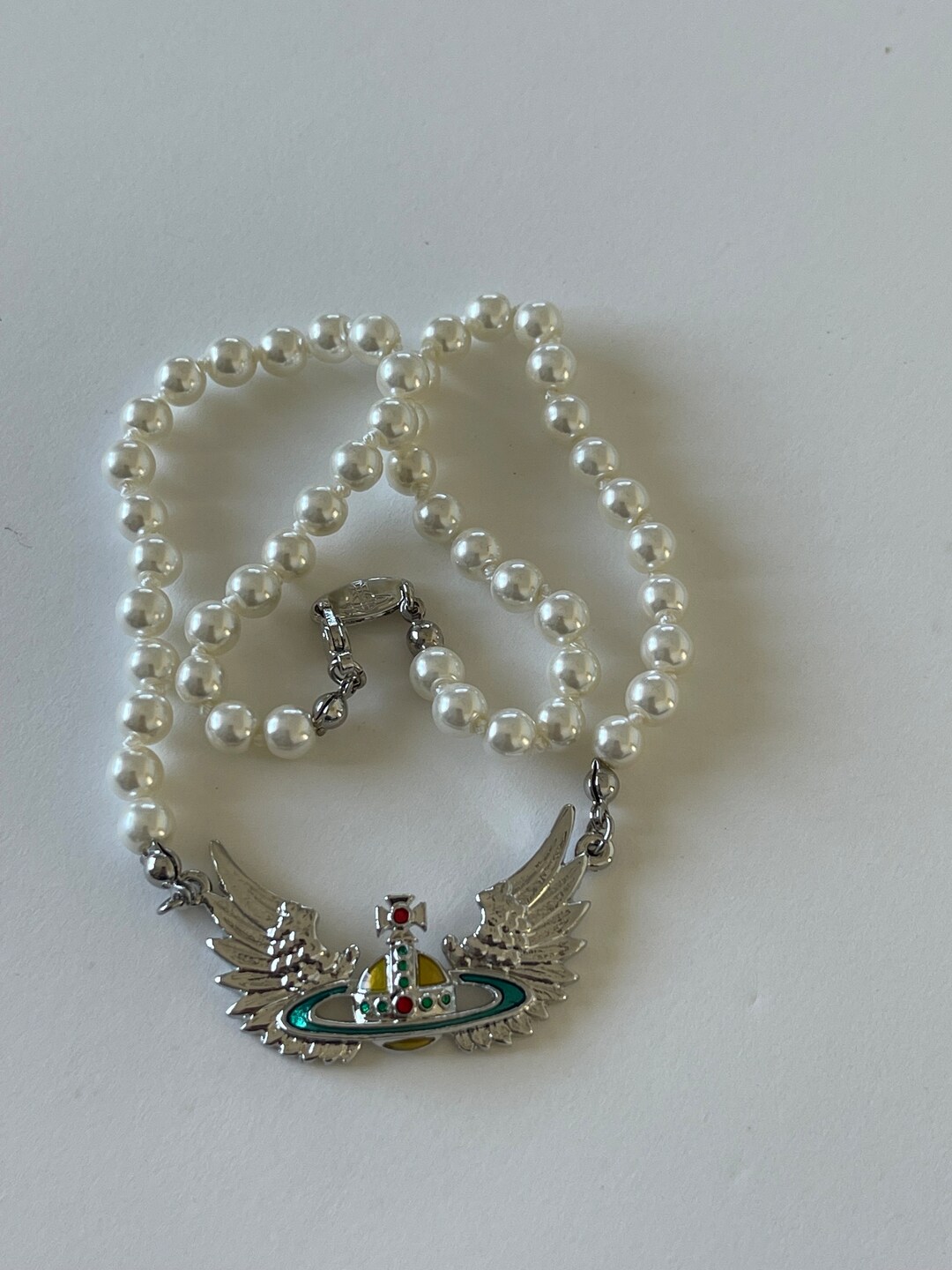 Winged Orb Pearl Necklace - Etsy
