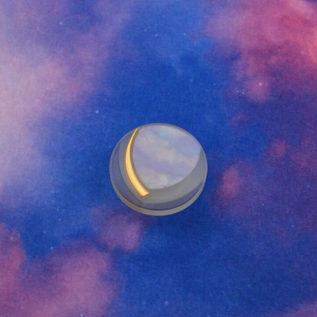 Clear Round Button With an Aurora Borealis Triangle and a Sliver of ...