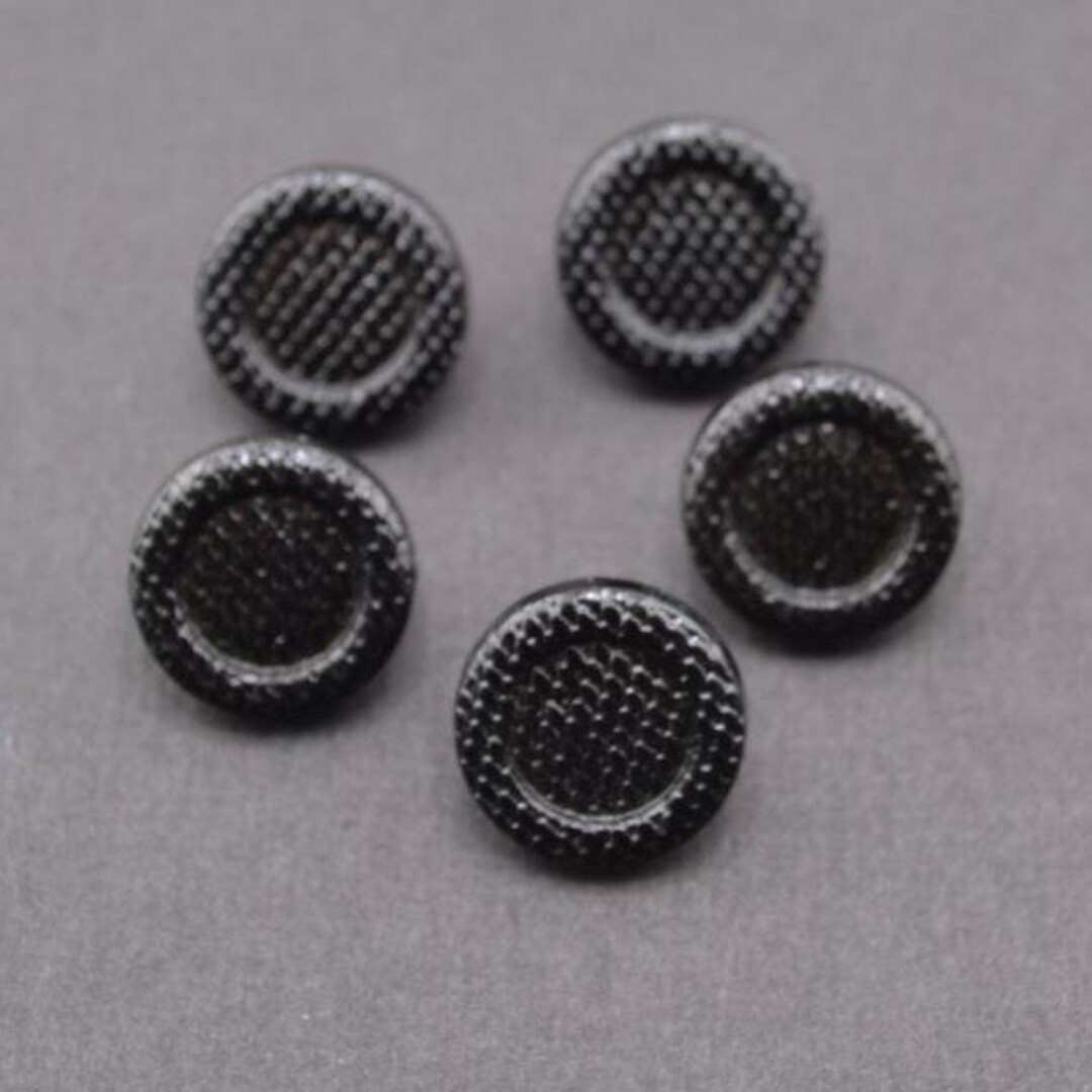 Shiny Black Button With a Rim Showing a Cross Hatch Texture – Shank (Z ...