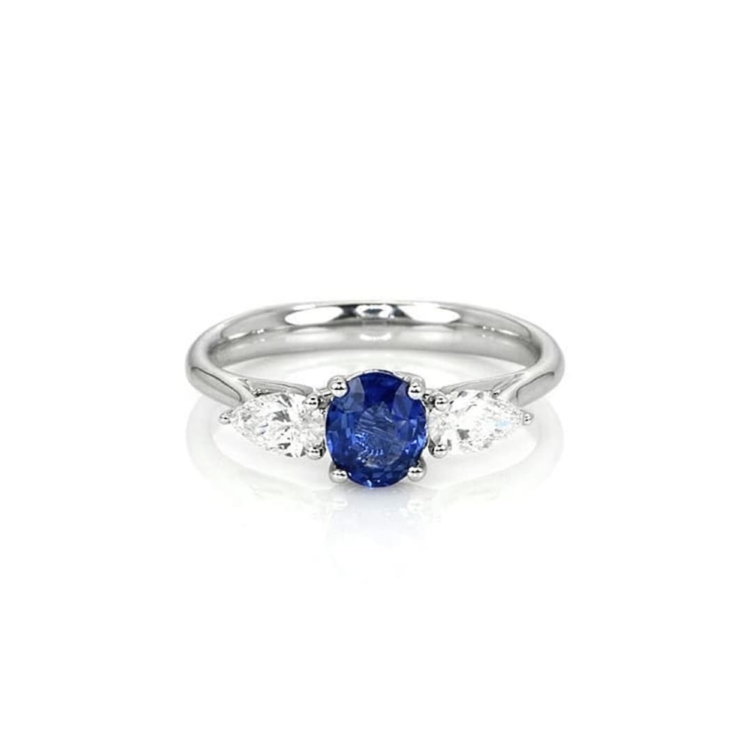2 CT Center Blue Round Cut Sapphire Diamond Side Two Pear Cut Diamond ...