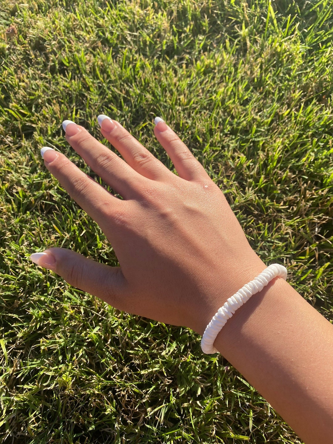 The Puka Shell Bracelet | White Shell Disc Bracelet, Beach Jewelry ... The Puka Shell Bracelet | White Shell Disc Bracelet, Beach Jewelry ...