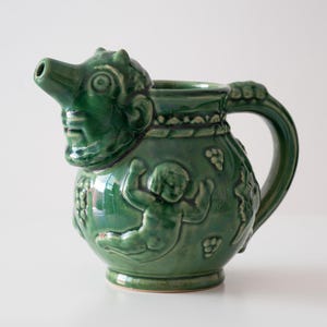 Vintage Green Ceramic Jug With Mythical Devil Face Spout and Cherub ...