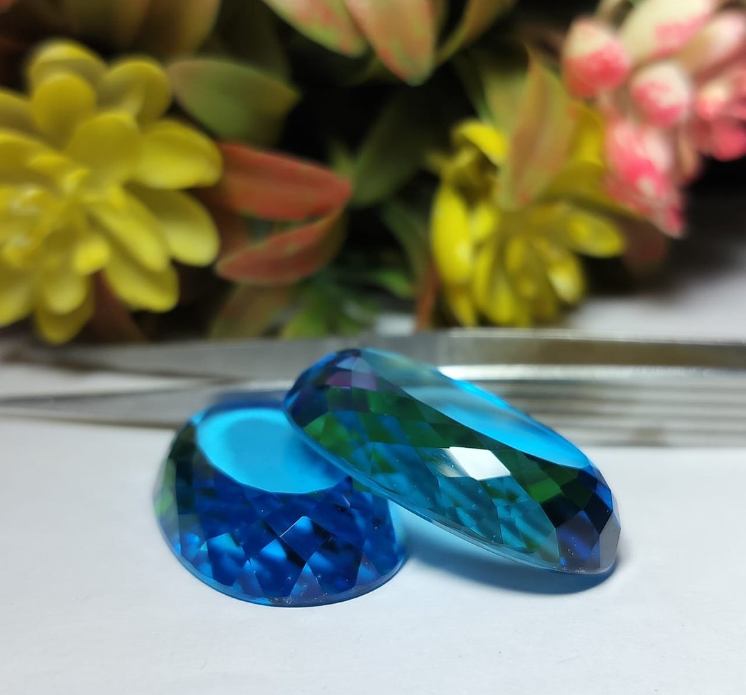 Lab Created Blue Topaz Gemstone, Oval Faceted Portrait Cut (20X15X6 ...