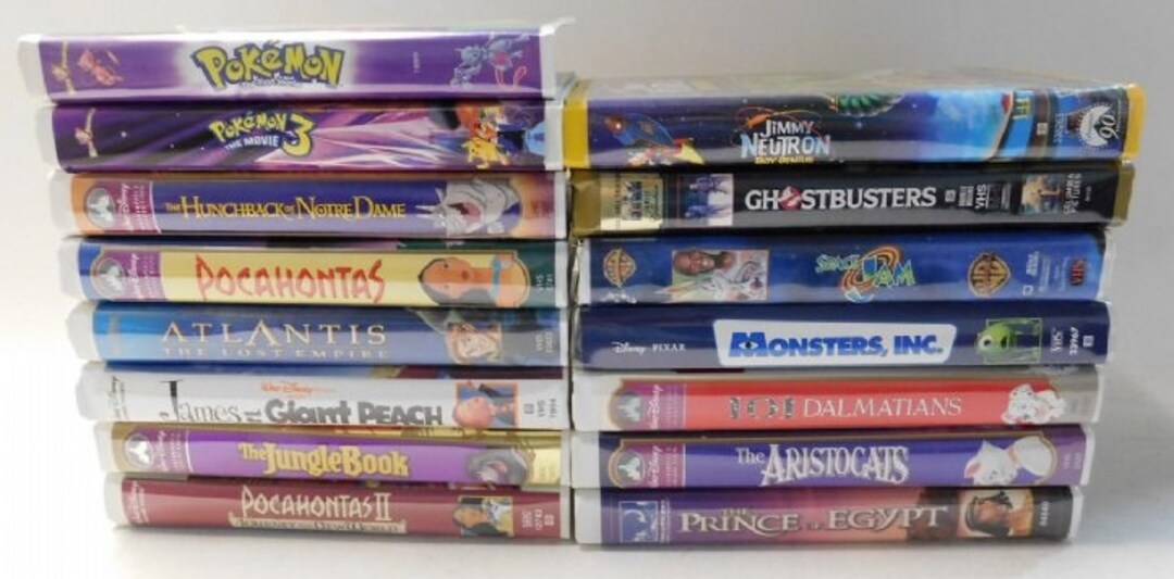 15 VHS Movies Disney, Pokemon, Monsters, Space Jam, Ghostbusters, More ...