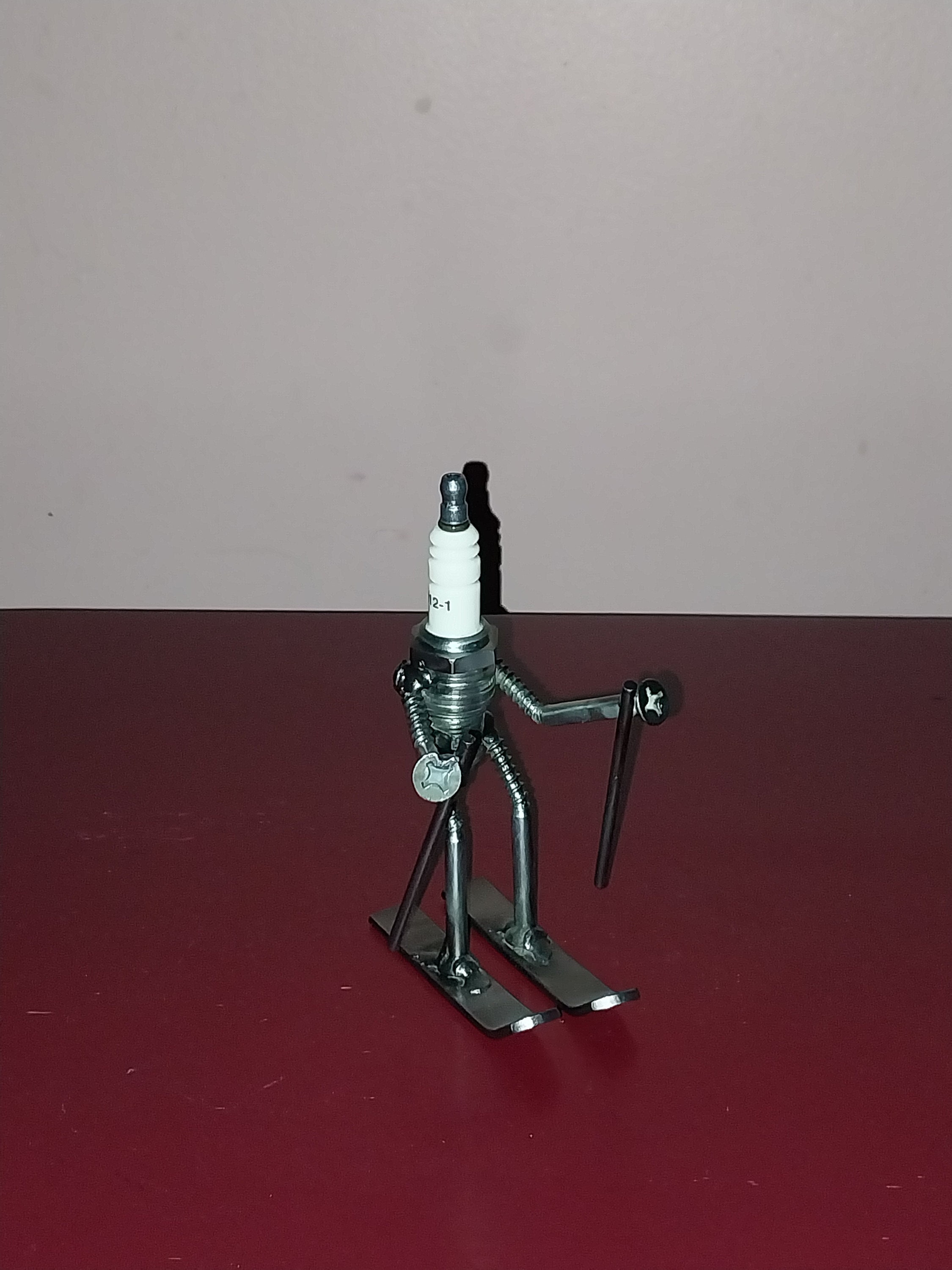 Handcrafted Spark Plug Skier - Etsy