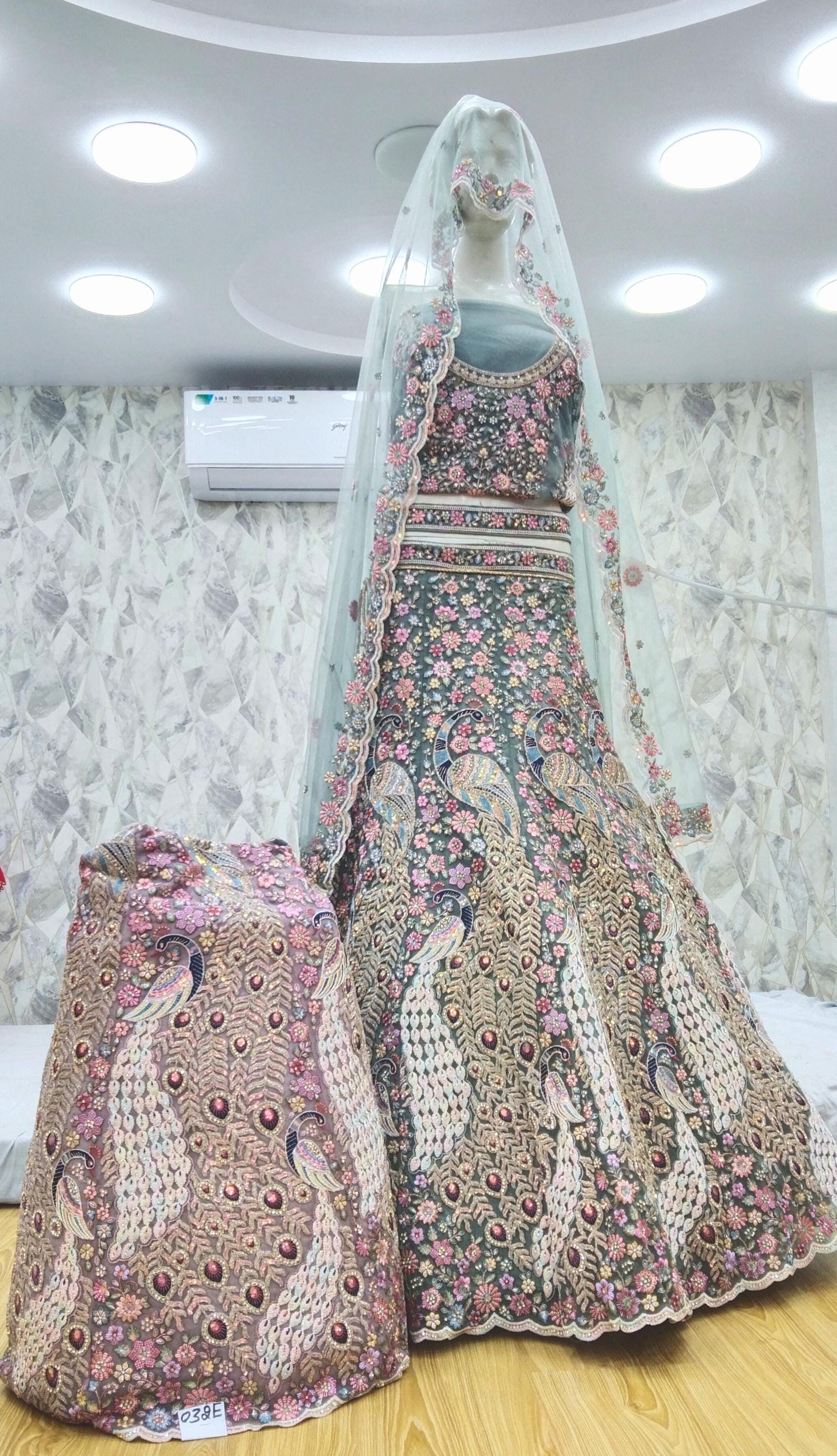 Sabhya Sachi Bridal Lehenga, Adorable Multicolor Embroidered Soft Net ...