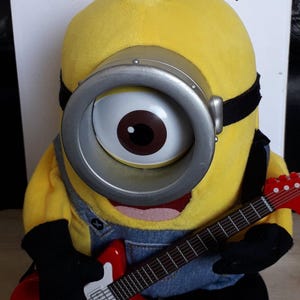 Despicable Me Minion Rock N Roll Dances Sings and Plays Guitar - Etsy
