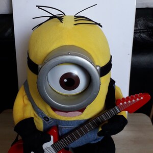 Despicable Me Minion Rock N Roll Dances Sings and Plays Guitar - Etsy