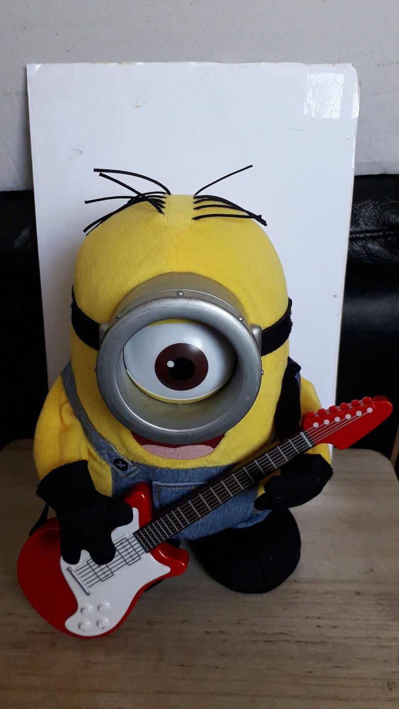 Despicable Me Minion Rock N Roll Dances Sings and Plays Guitar - Etsy