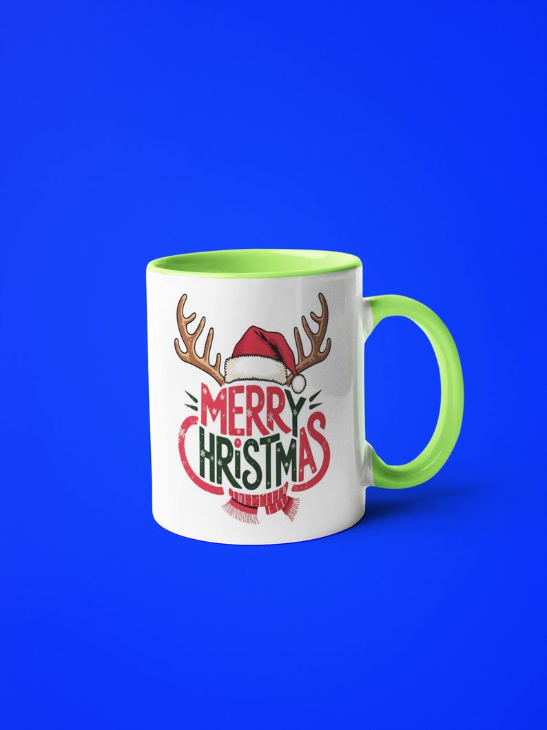Taza de café navideña con diseño de astas de reno y gorro de Papá Noel ...