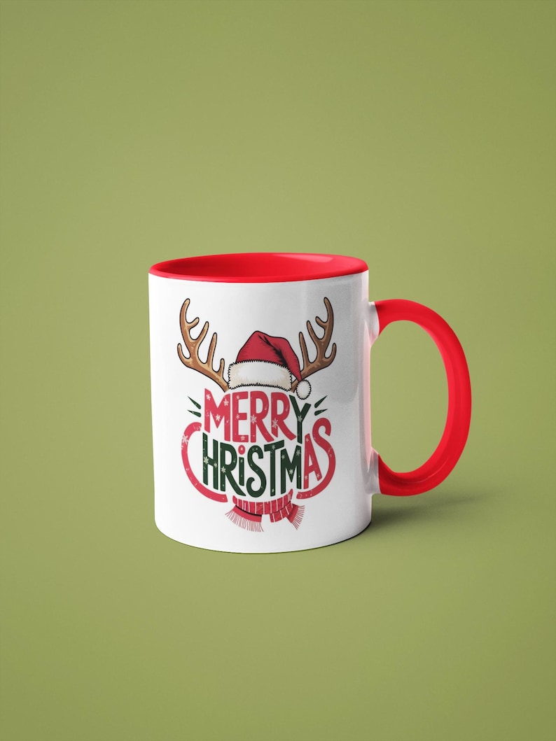 Taza de café navideña con diseño de astas de reno y gorro de Papá Noel ...