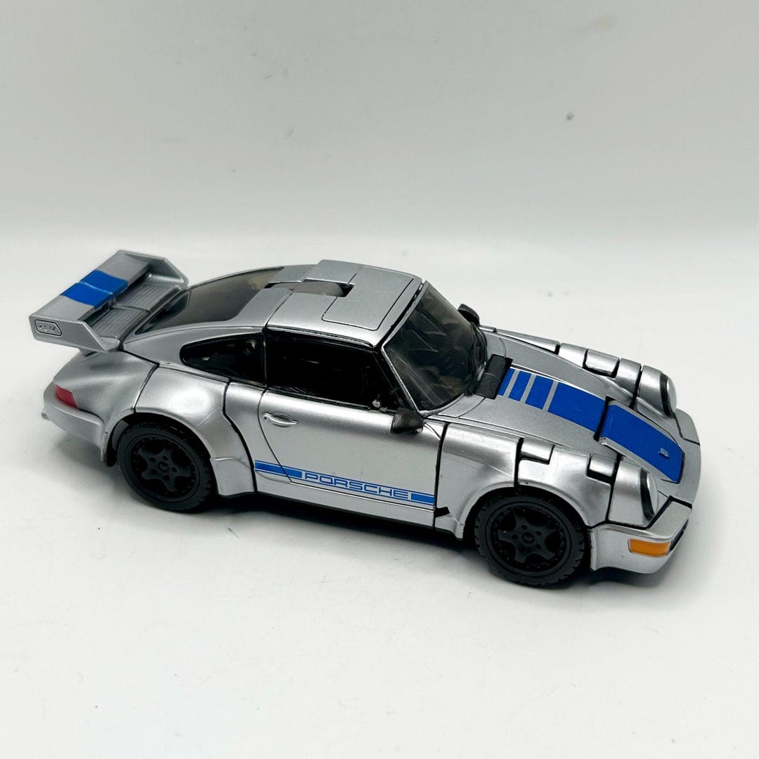 Hasbro Transformers Mirage Studio Series SS105 Deluxe Autobot Action ...