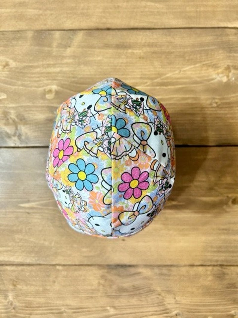 Floral Hello Kitty Welding Cap Flowers Hello Kitty Reversible Pipe ...