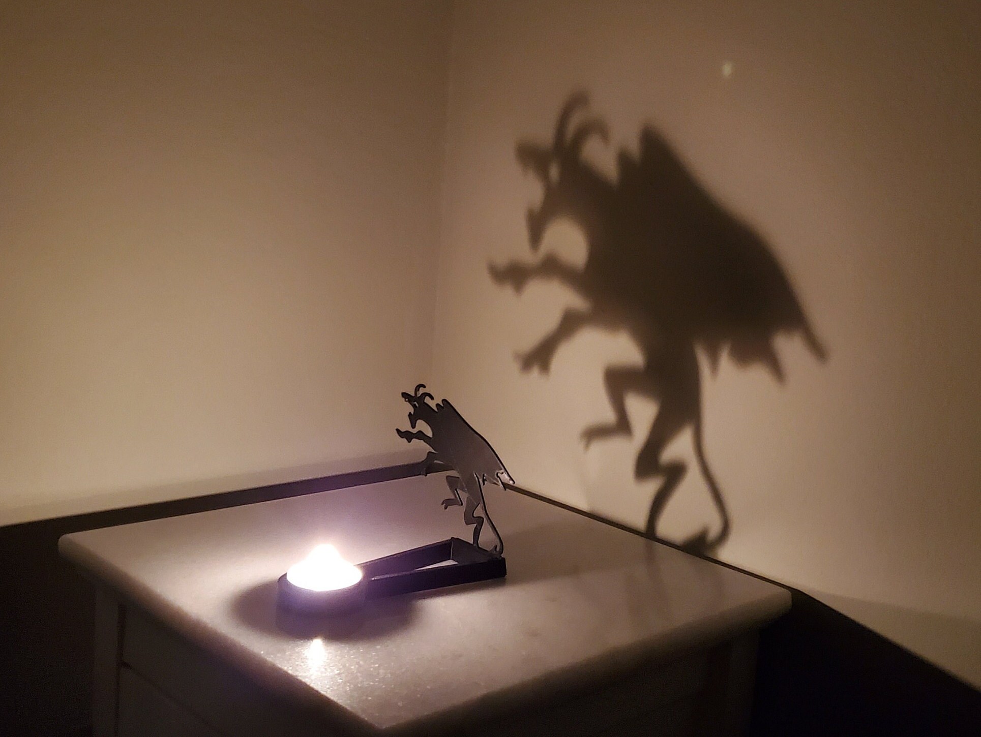 Kealite Jersey Devil Shadow Caster tealight Candle Sold - Etsy