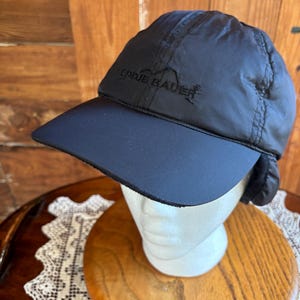 Eddie Bauer | Goose Down | Black Trapper Hat, Black Winter Hats ...