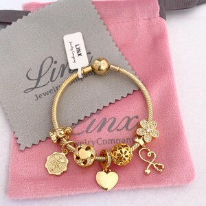 Linx Yellow Gold Snake Chain Bracelet With Registered Nurse RN Themed ...
