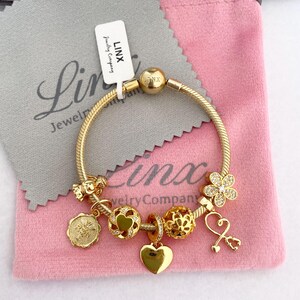Linx Yellow Gold Snake Chain Bracelet With Registered Nurse RN Themed ...