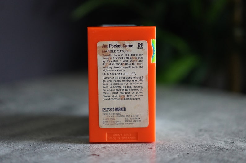 1976 Drop N' Catch Pocket Game Marble Catch TOMY - Etsy