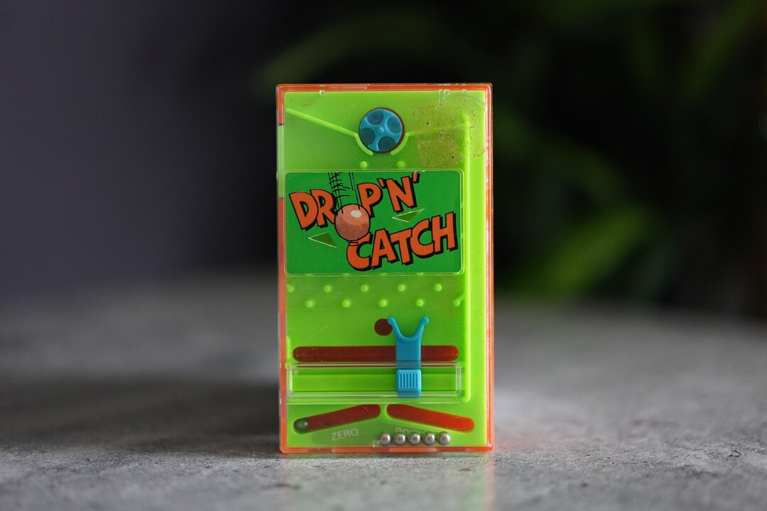 1976 Drop N' Catch Pocket Game Marble Catch TOMY - Etsy