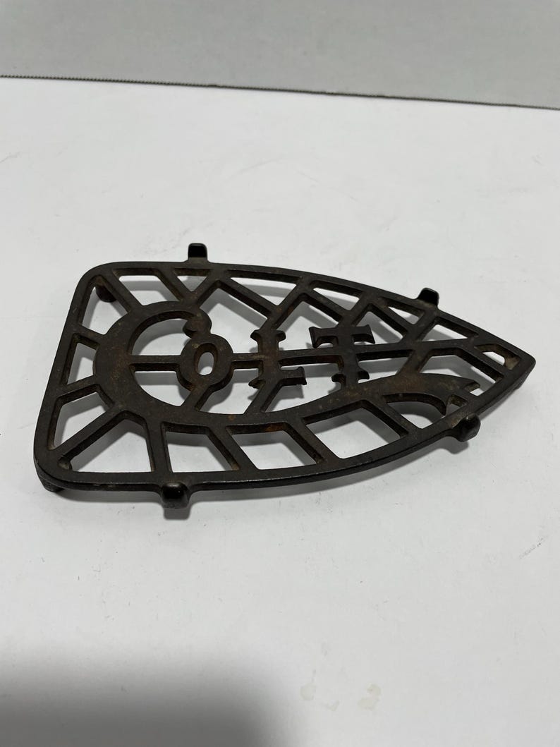 Vintage Sad Iron COLT Cast Iron Trivet - Etsy