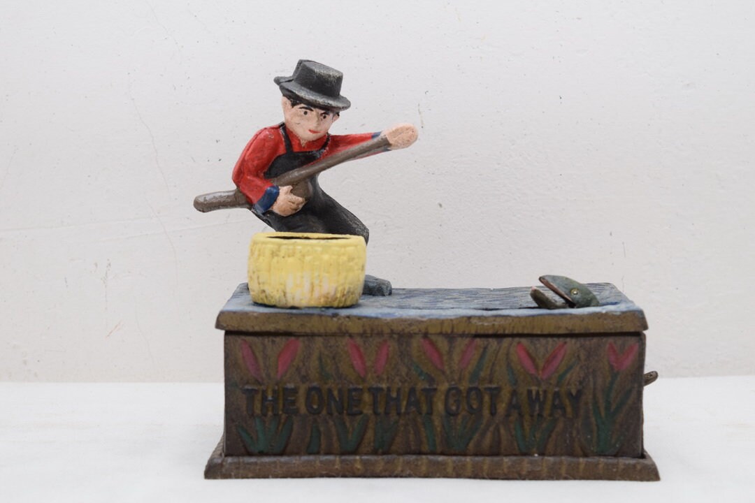 Cast Iron Mechanical Bank Handler With a Snake Money Box Mechanical ...