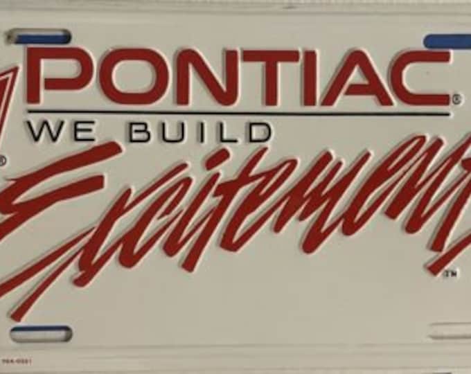 Vintage 1992 Metal Pontiac License Plate Embossed “we Build Excitement ...